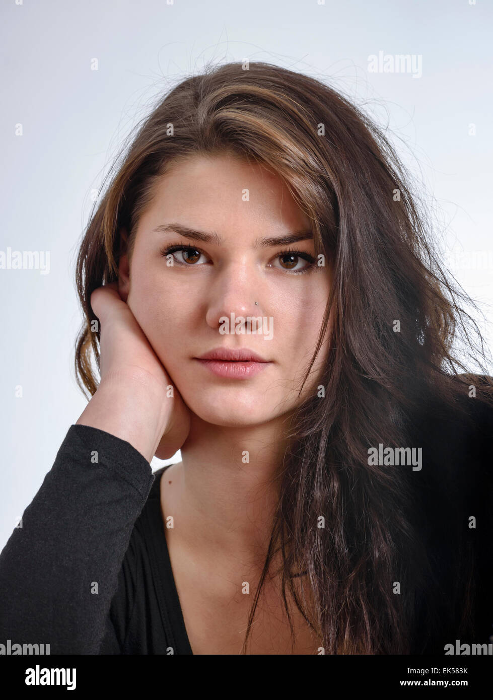 Italy, female teenager studio portrait Stock Photo - Alamy