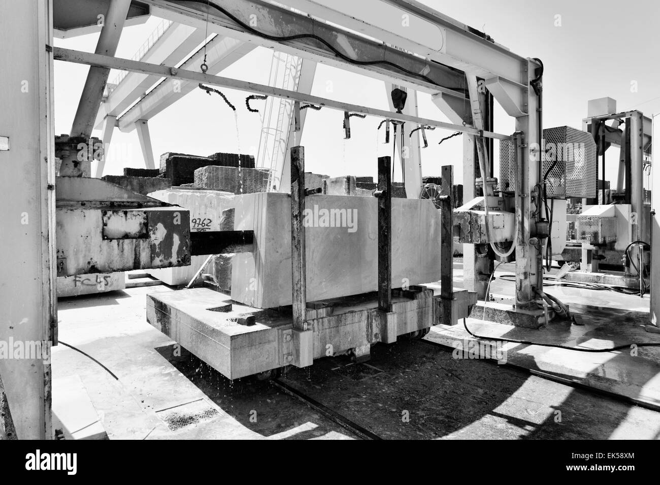 Italy, marble cutting factory, marble block cooled with water while ...