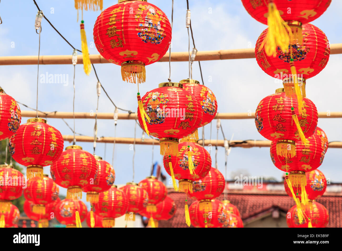 Red chinese new year lanterns hang on rope Stock Photo - Alamy