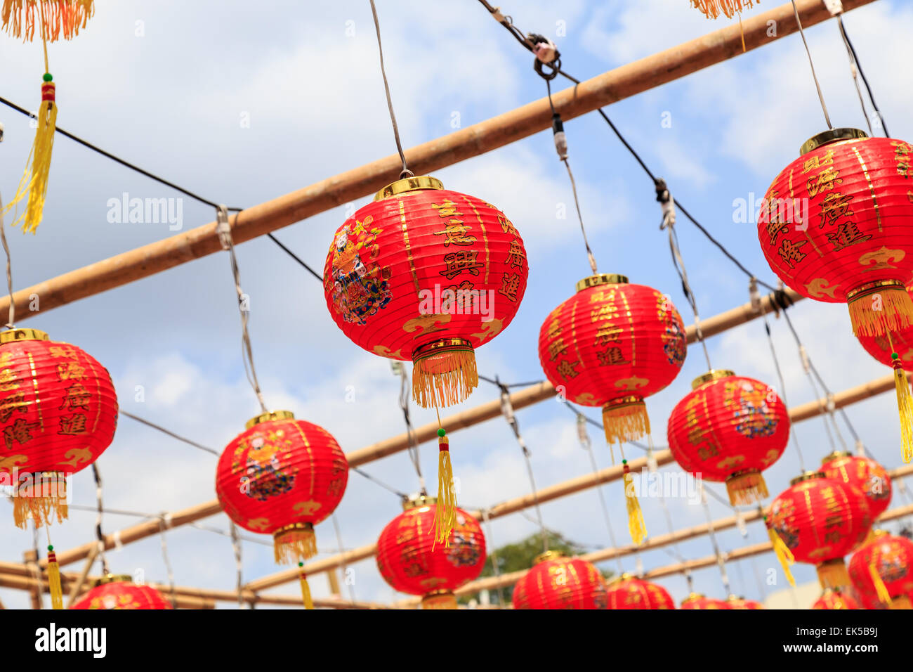 Red chinese new year lanterns hang on rope Stock Photo - Alamy