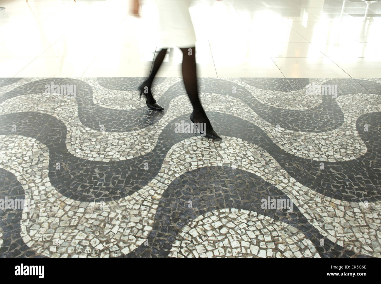 curvy mosaic floor with abstract feet Stock Photo - Alamy