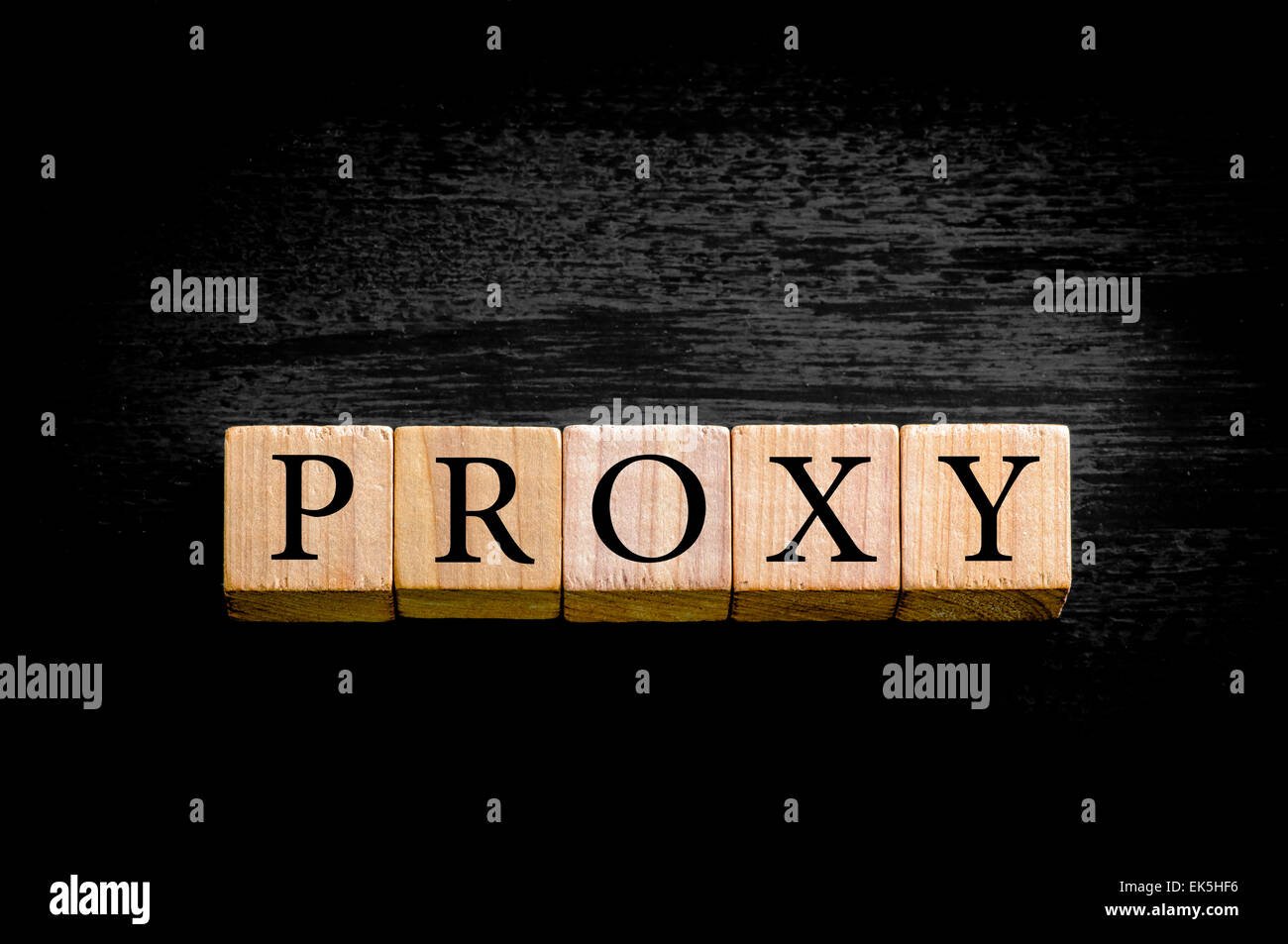 Word PROXY. Wooden small cubes with letters isolated on black ...