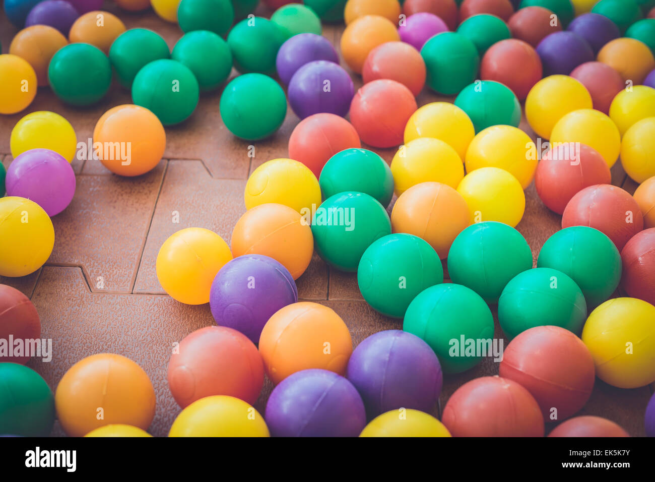Close up Colorful plastic ball in playground Stock Photo - Alamy