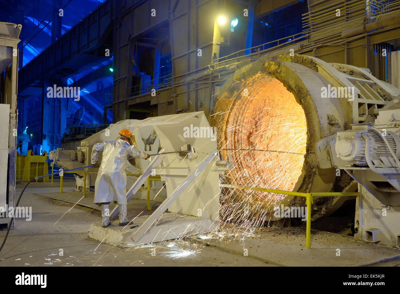 cleaning melting ladle inside of steel plant Stock Photo - Alamy