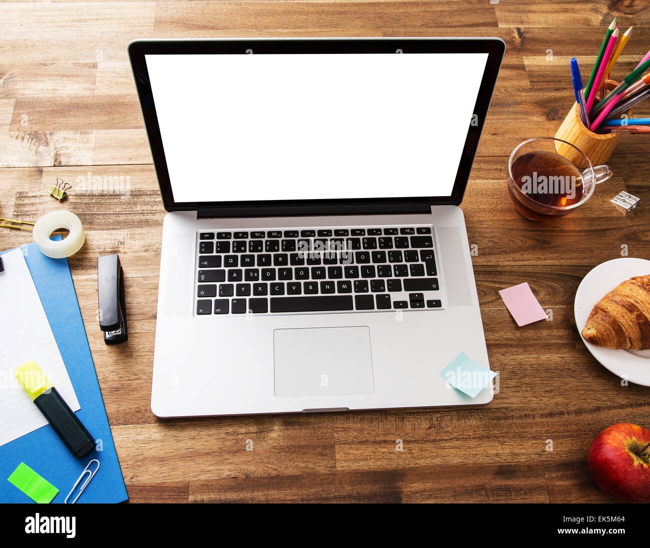 Workplace with notebook, office supplies and wooden desk Stock Photo ...