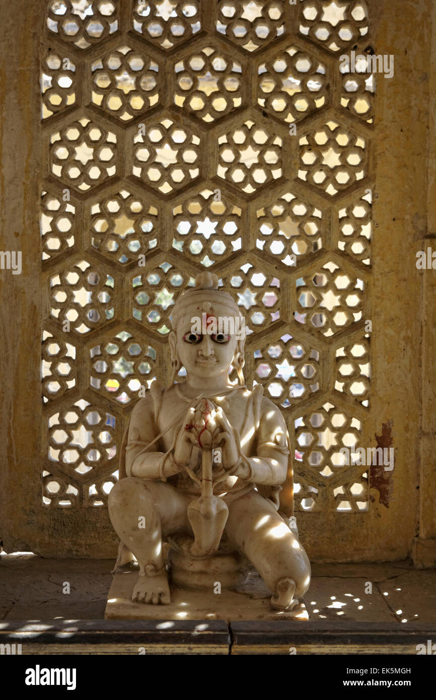 India, Rajasthan, Jaipur, old hindu religious statue in a street altair ...