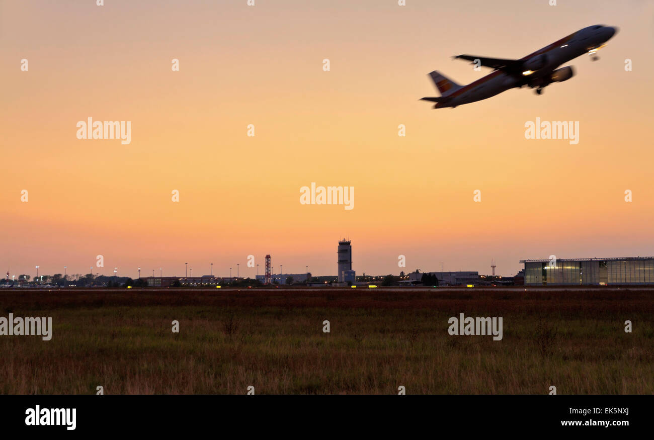 Italy, Venice International Airport and an airplane on take-off at ...