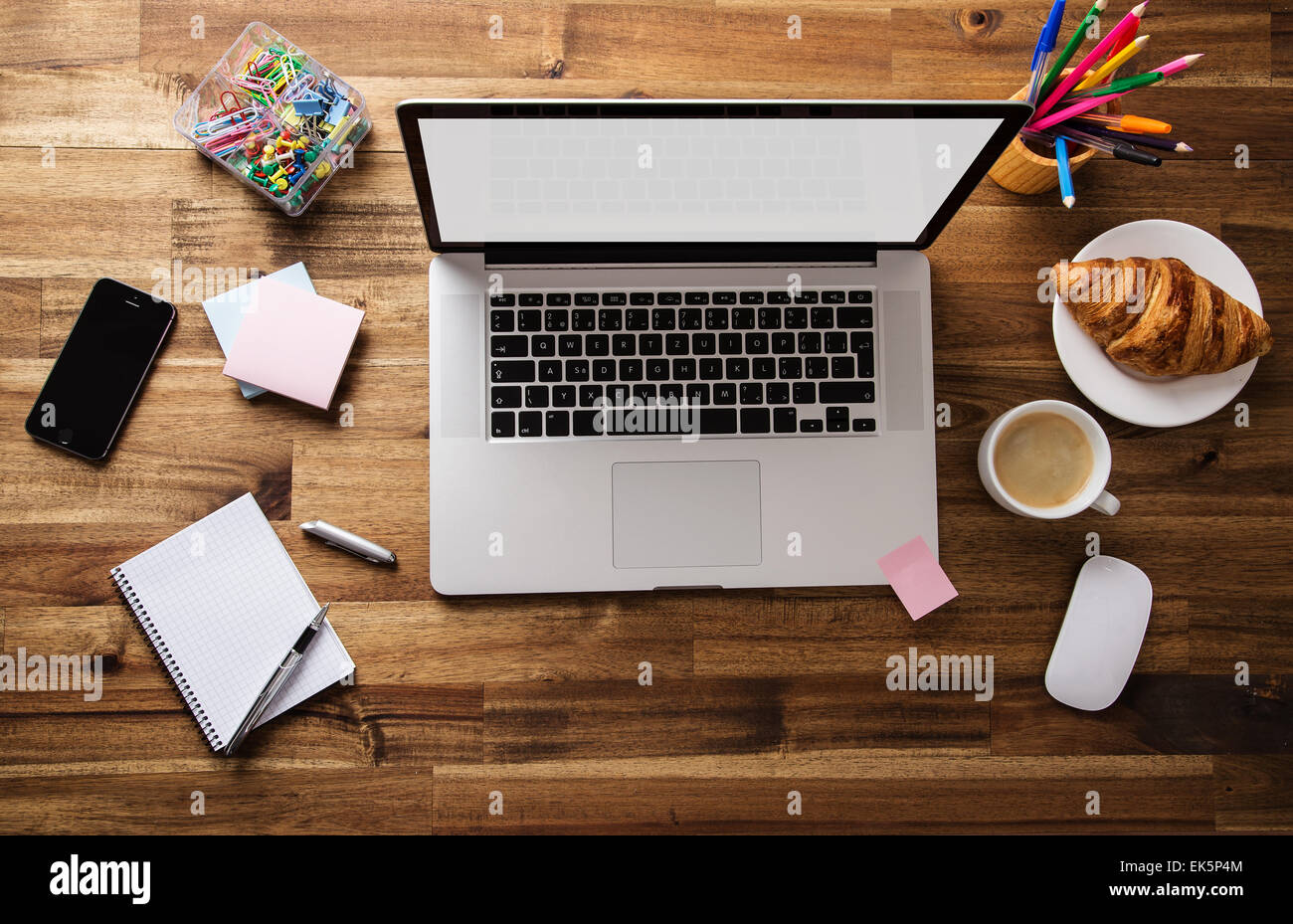 Workplace with notebook, office supplies and wooden desk Stock Photo ...