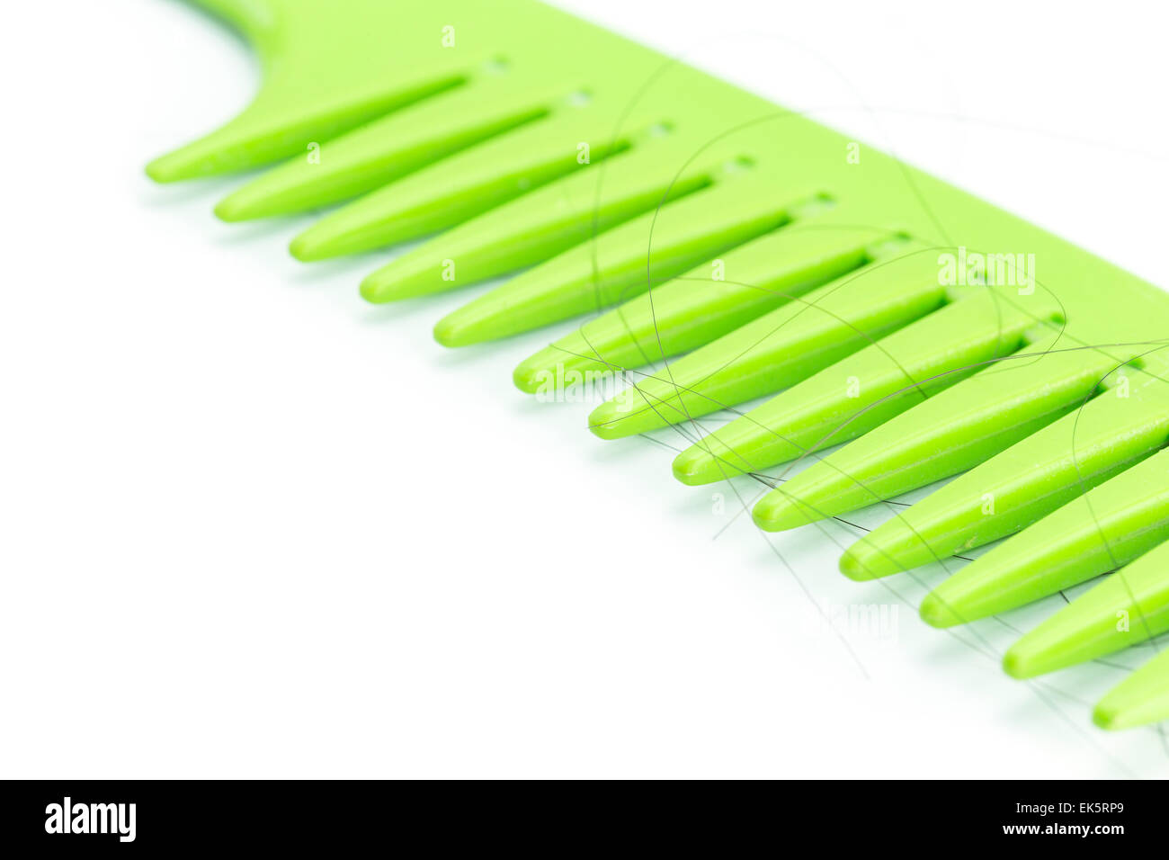Close up Green comb with hair, Hair Loss concept Stock Photo - Alamy