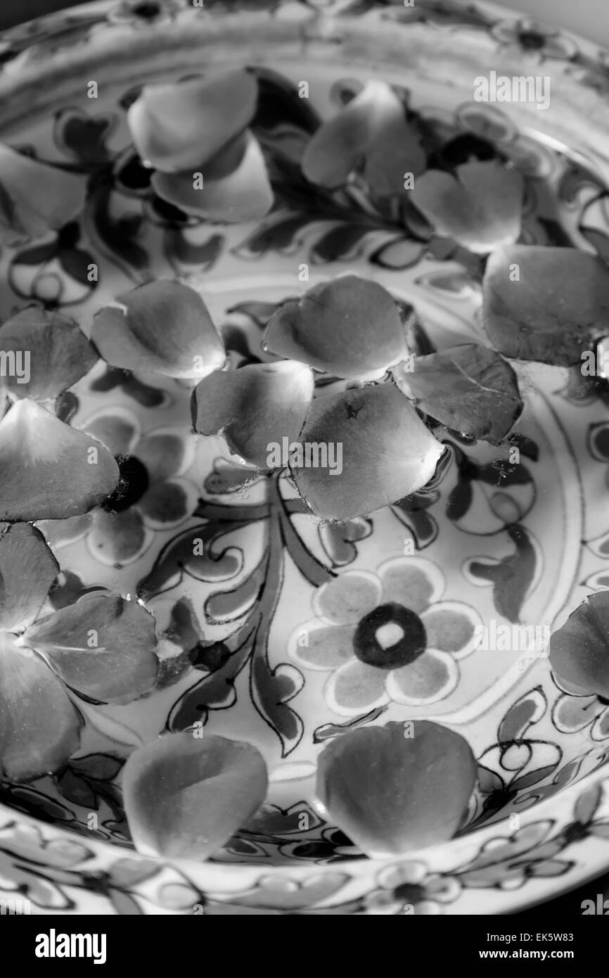 India, Rajasthan, Jaipur, rose petals in a bowl full of water Stock ...