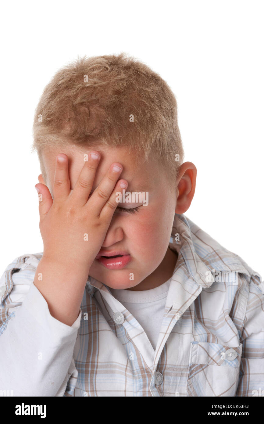 Portrait of a little boy with a headache on white background Stock ...