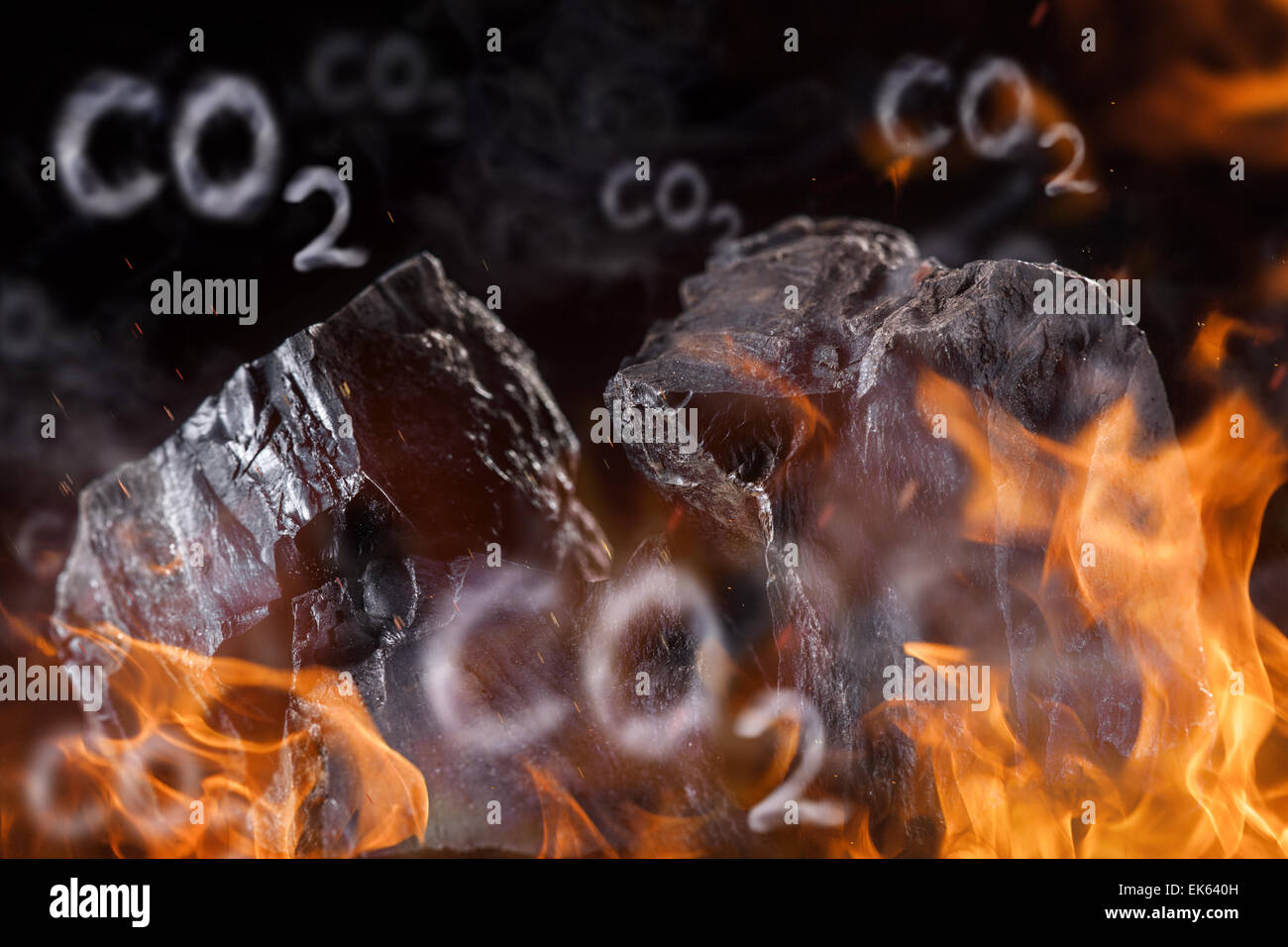 Coal lumps with fire flames, close-up Stock Photo - Alamy