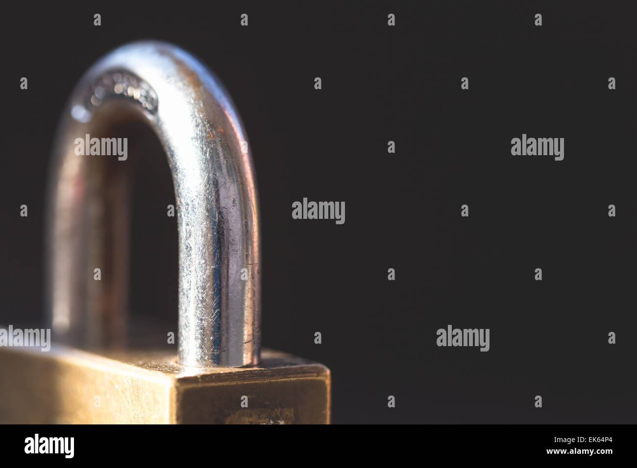 Close up lock on black background Stock Photo - Alamy