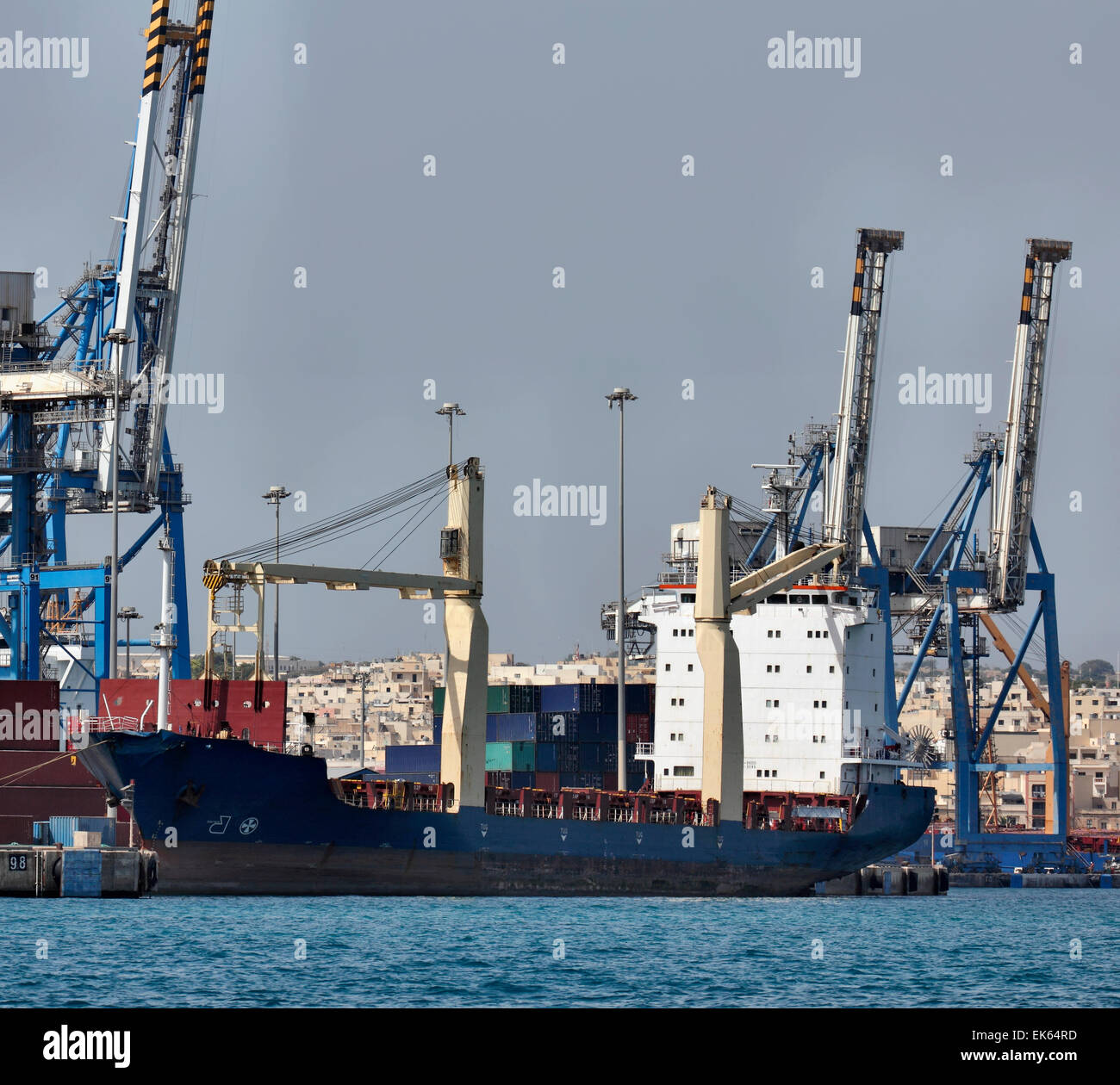 Malta Island, Marsaxlokk, cargo ships loading factory Stock Photo - Alamy