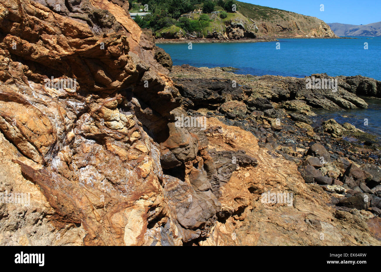 Lava formations, remnants of a miocene volcano Akaroa, Banks Peninsula ...
