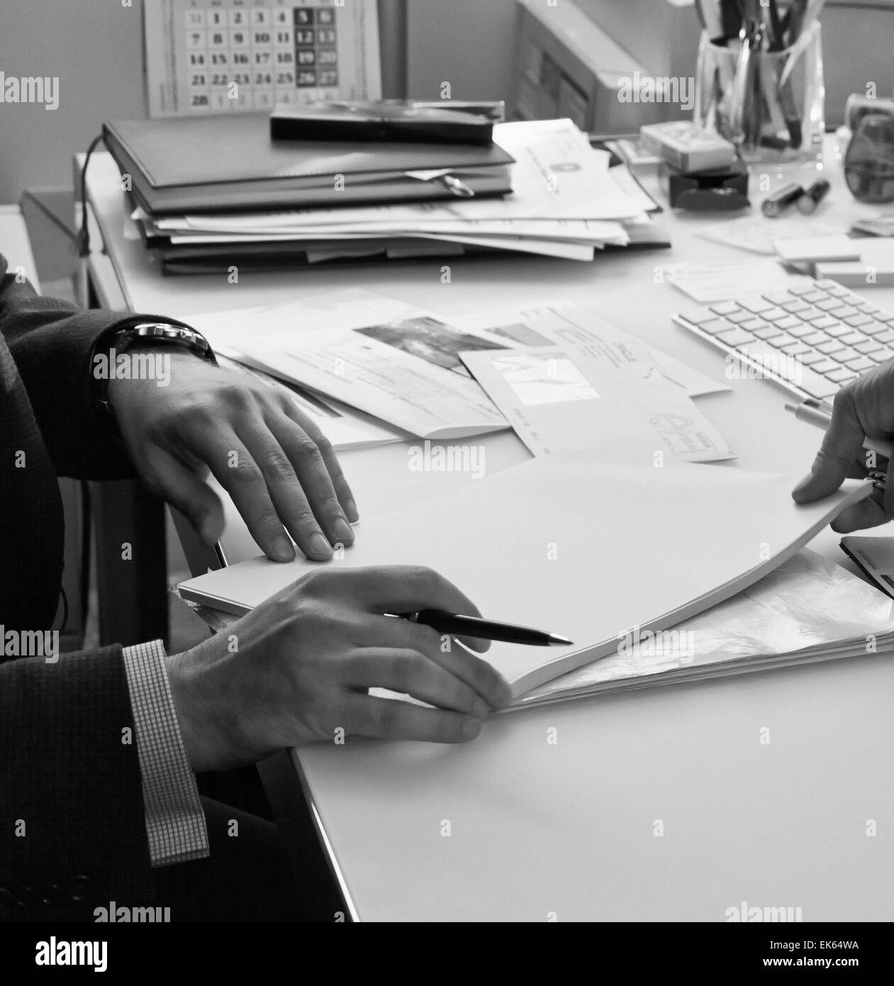 Businessman employee manager hands Black and White Stock Photos ...