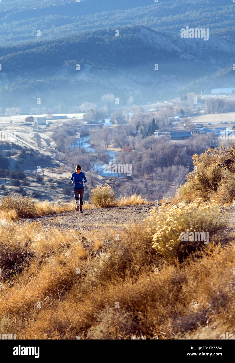 Beautiful young woman running on mountain trails near Salida, Colorado ...