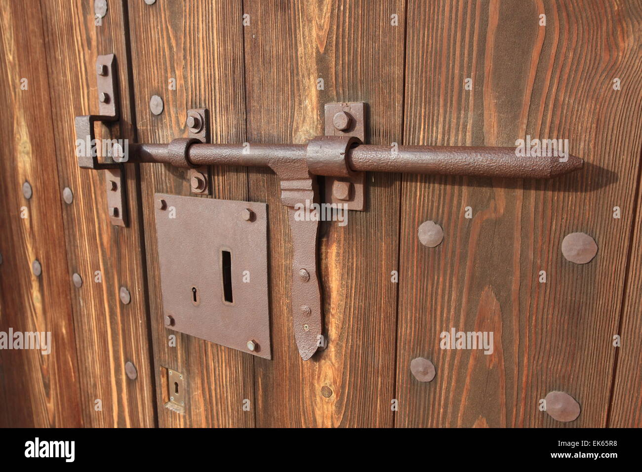 Metal lock on the wooden door in Barcelona, Catalunya, Spain Stock ...
