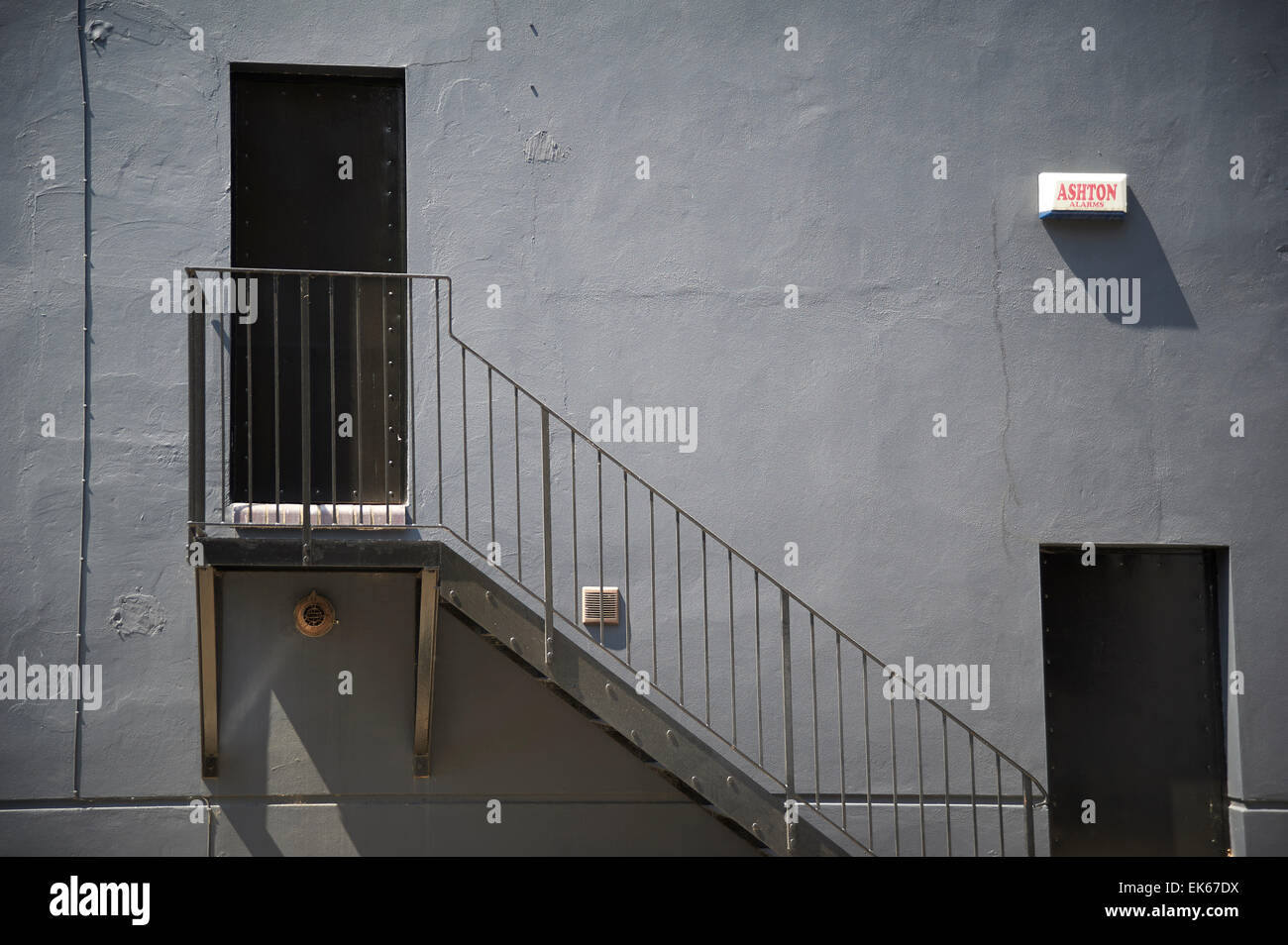 Steel fire escape leading from building Stock Photo - Alamy