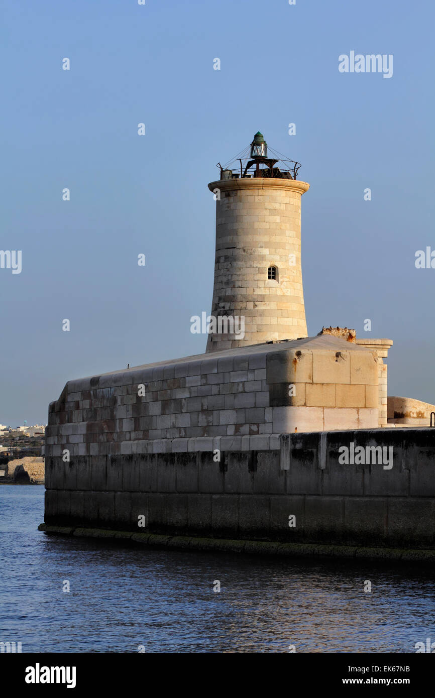 Malta Island, lighthouse at the entrance of Valletta port Stock Photo ...