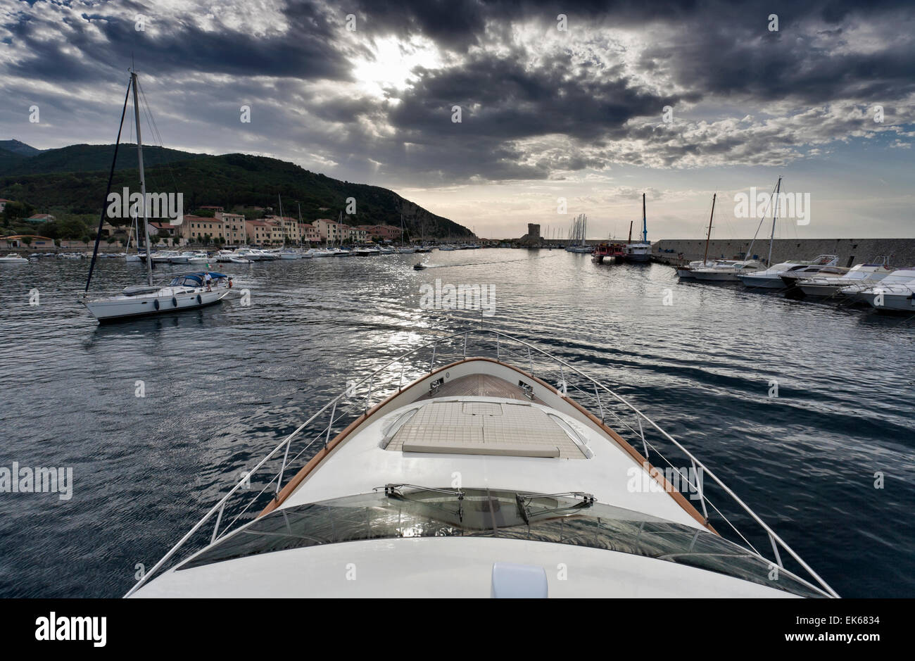 Italy, Tuscany, Elba Island, entering the port of Marciana Marina town ...