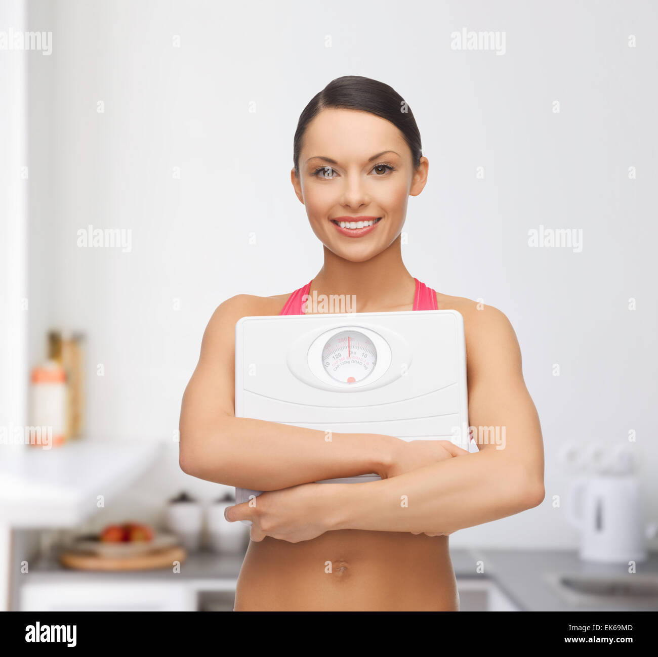 woman with scale Stock Photo - Alamy