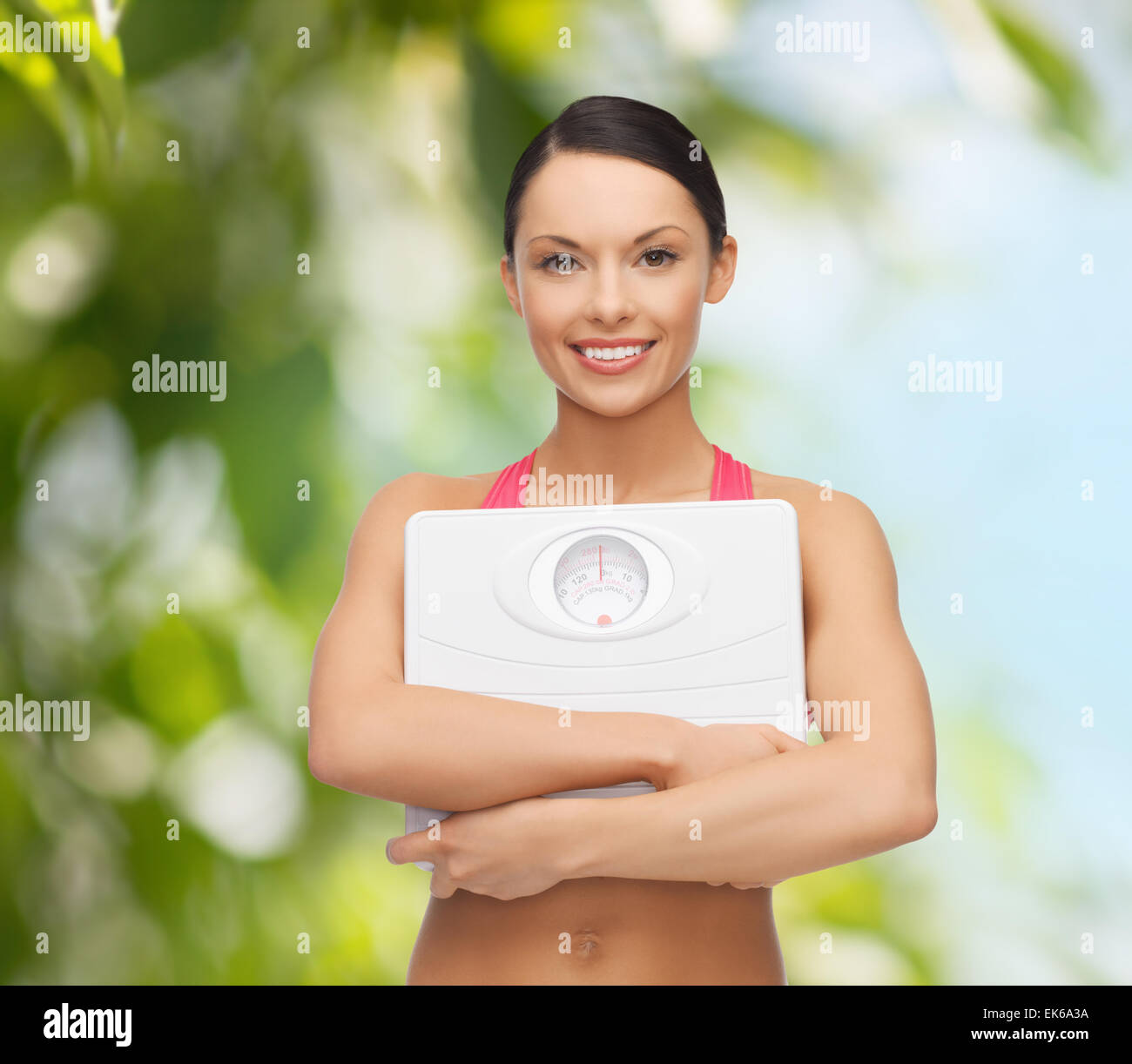 woman with scale Stock Photo - Alamy