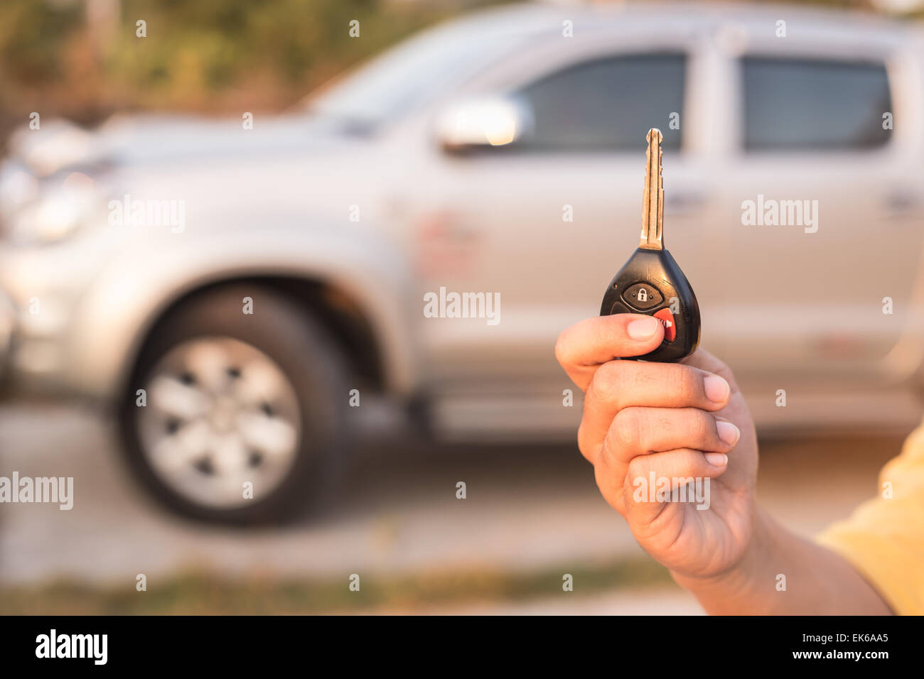 Close up Hand holding car key Stock Photo - Alamy