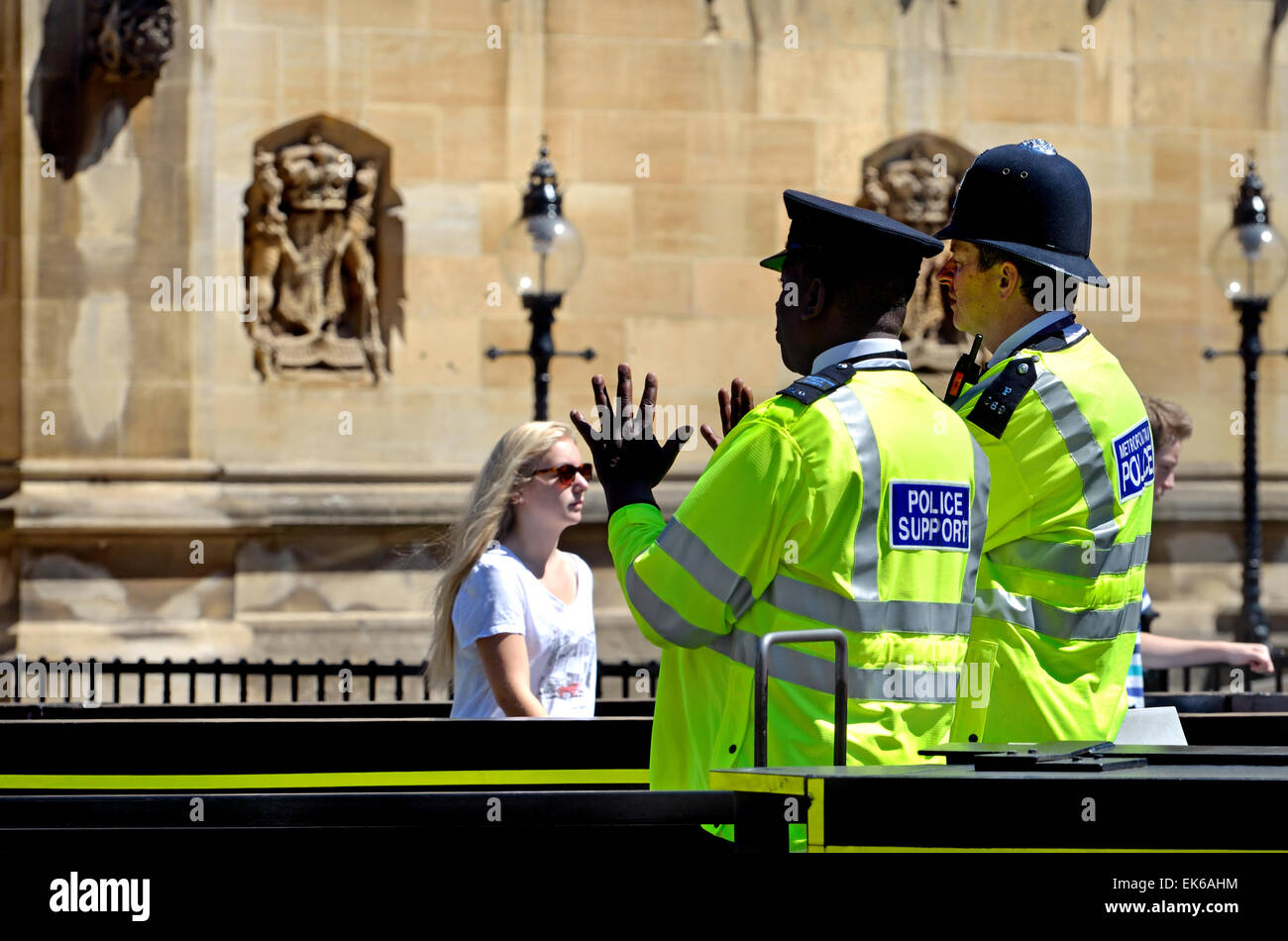 London, England, UK. Metropolitan police officer and police support ...