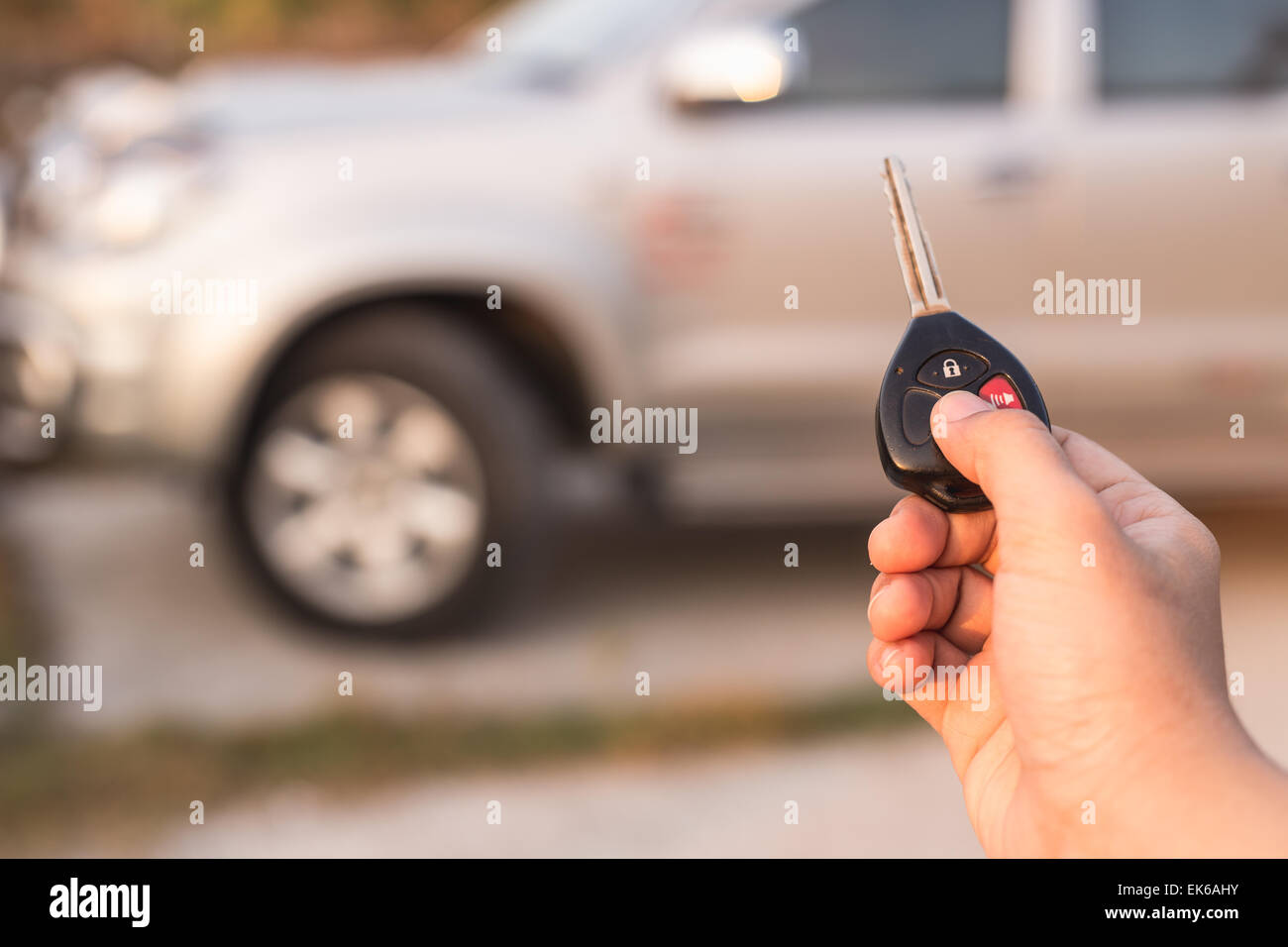 Close up Hand holding car key Stock Photo - Alamy