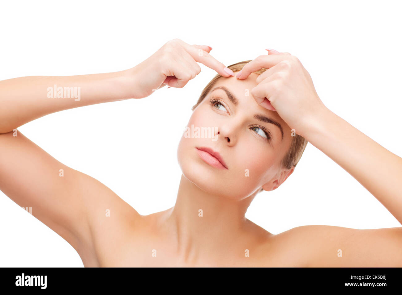 young woman squeezing acne spots Stock Photo - Alamy