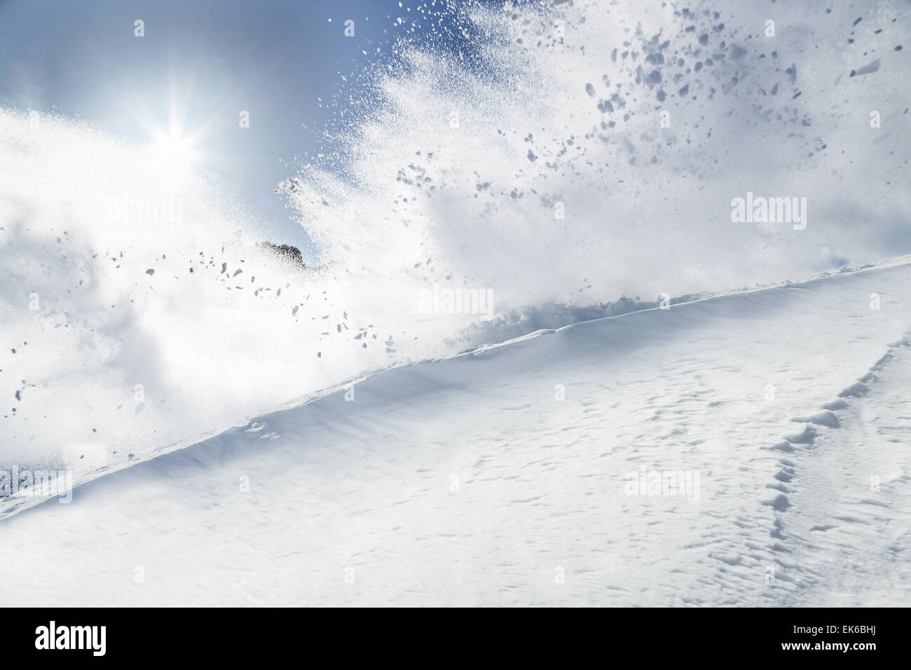 Snow explosion on mountains, freeze motion Stock Photo - Alamy