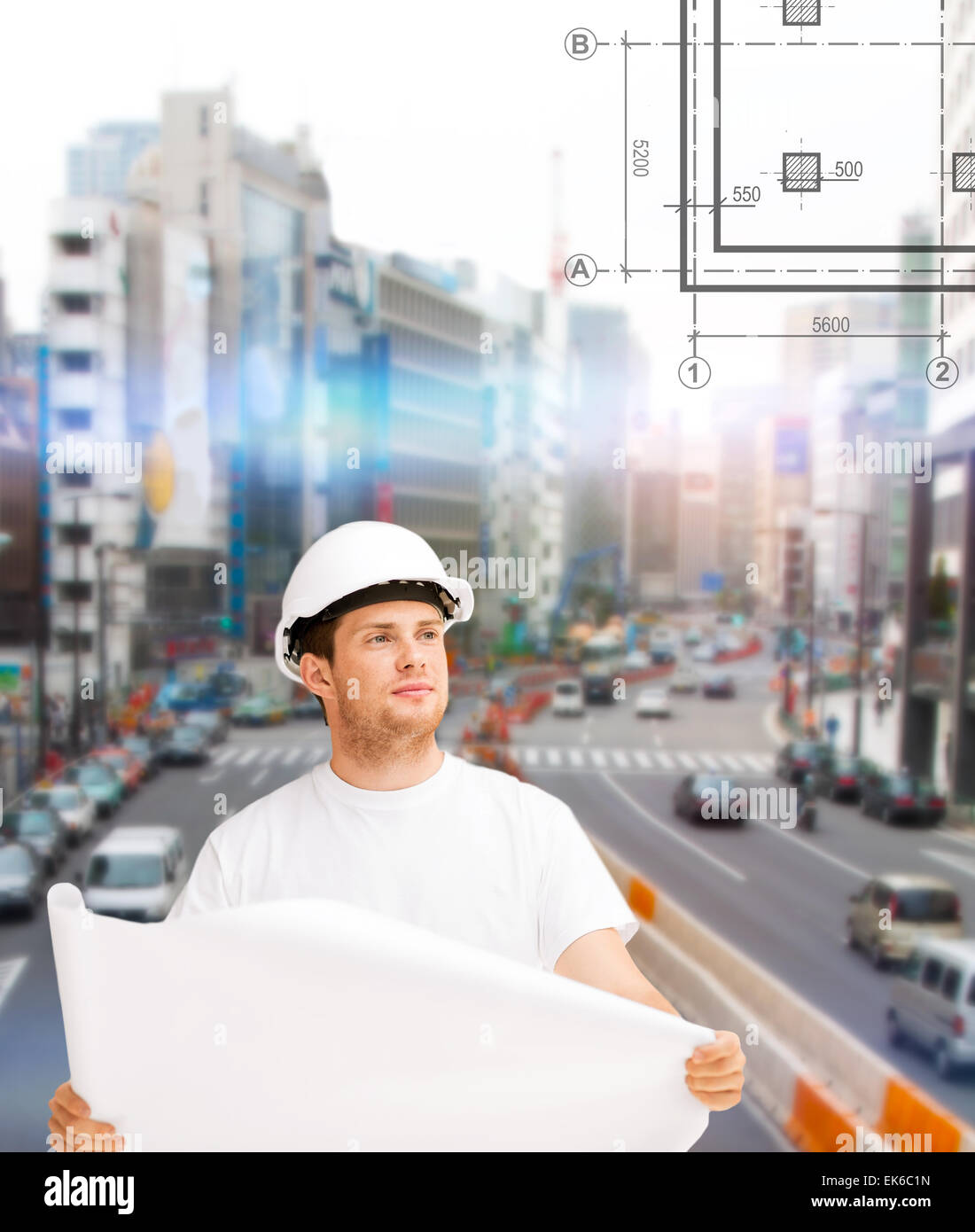 male architect looking at blueprint Stock Photo - Alamy