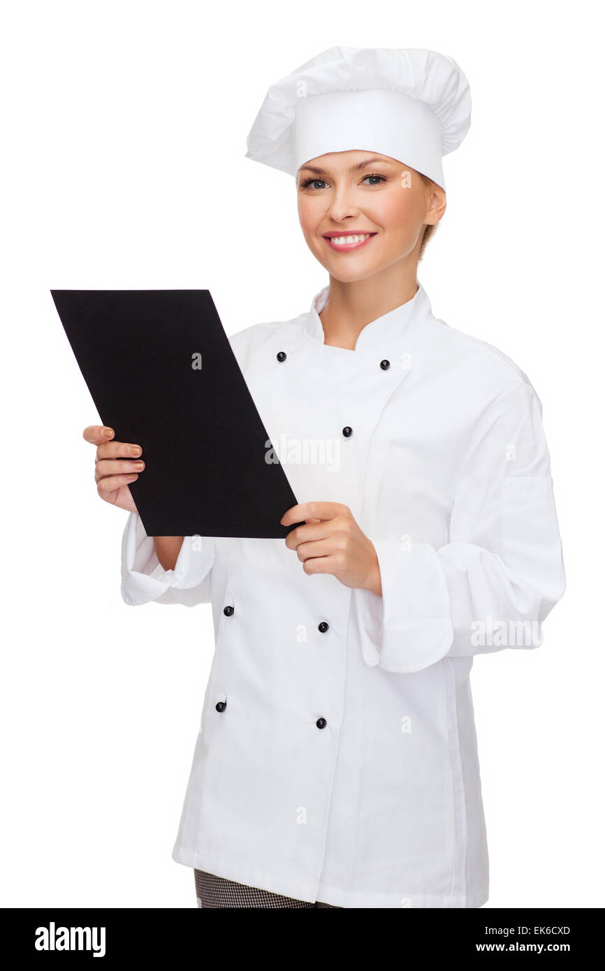 smiling female chef with black blank paper Stock Photo - Alamy