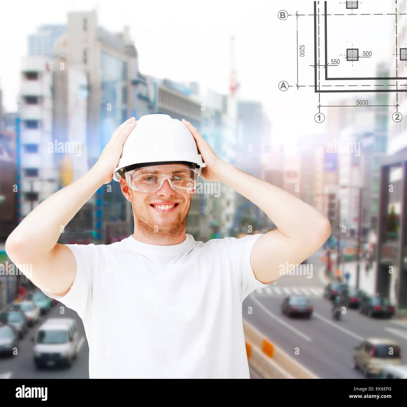 male architect in helmet with safety glasses Stock Photo - Alamy
