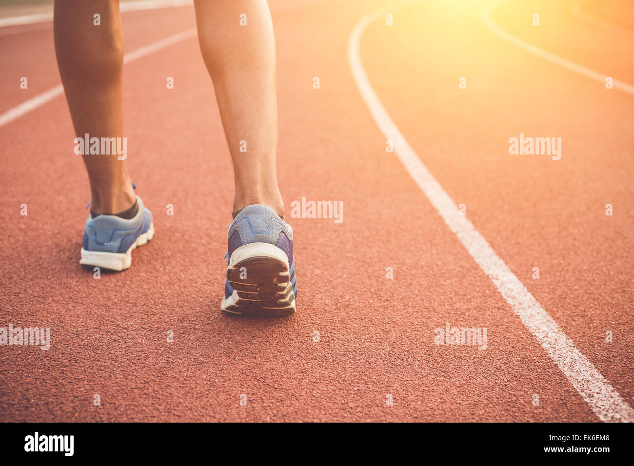 Close up runner feet on running stadium Stock Photo - Alamy