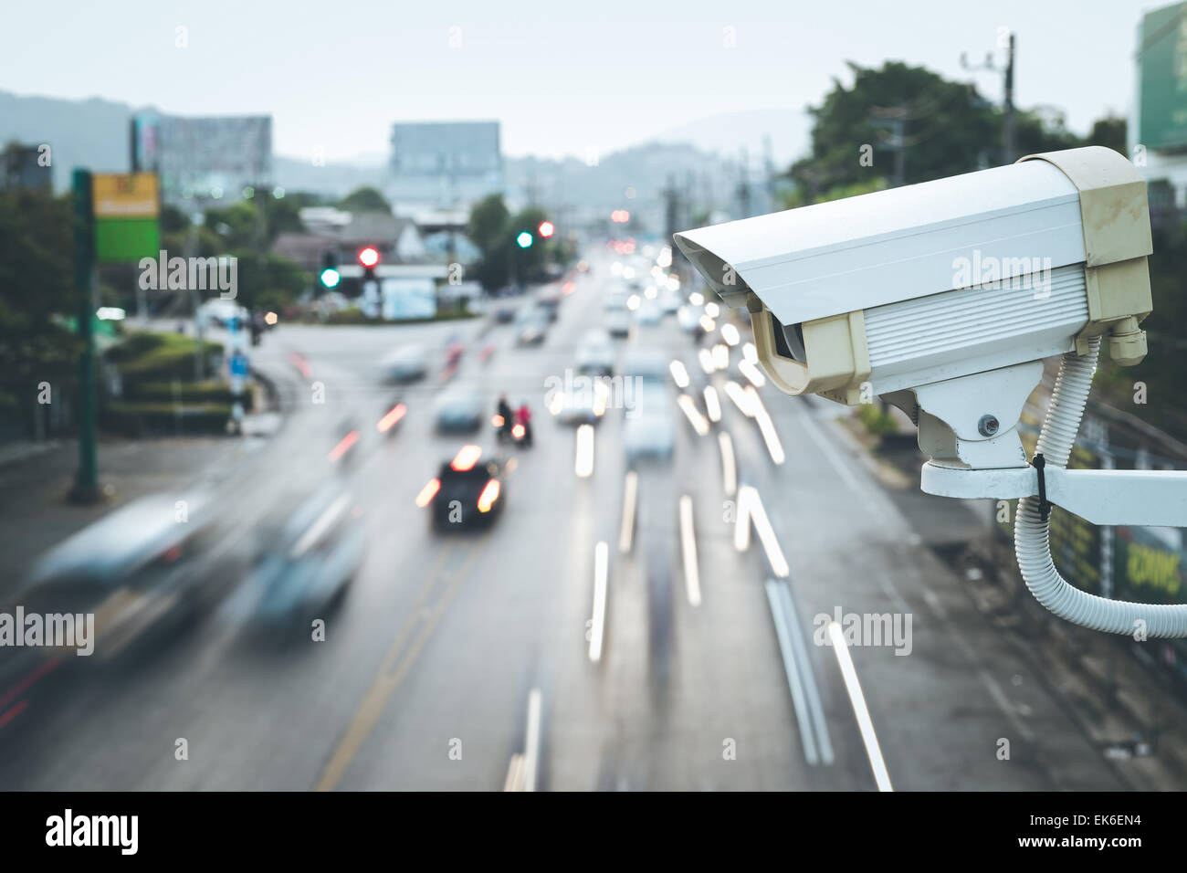 Close up Security CCTV camera operating over the road Stock Photo - Alamy