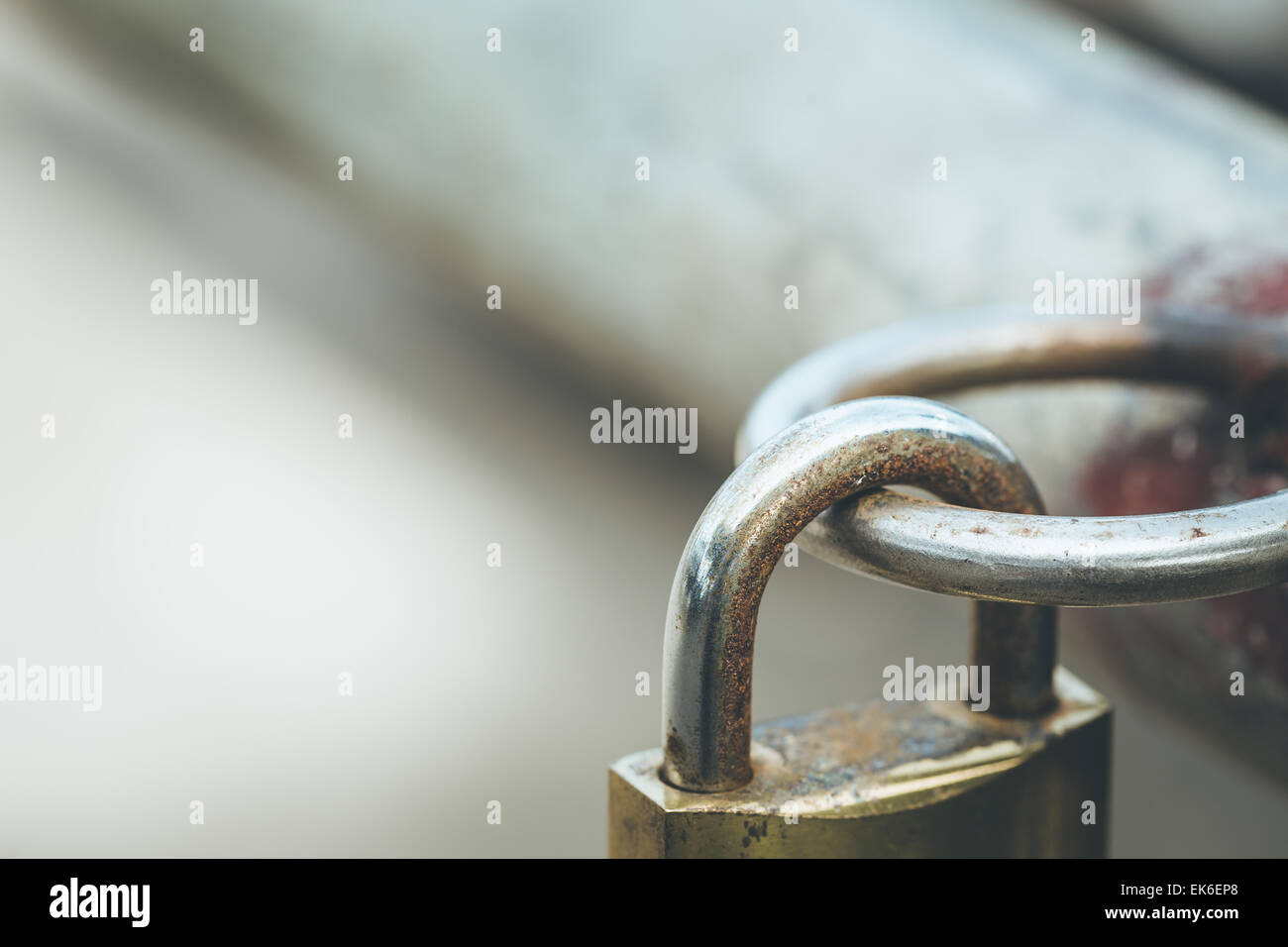 Macro Lock hang on round steel Stock Photo - Alamy