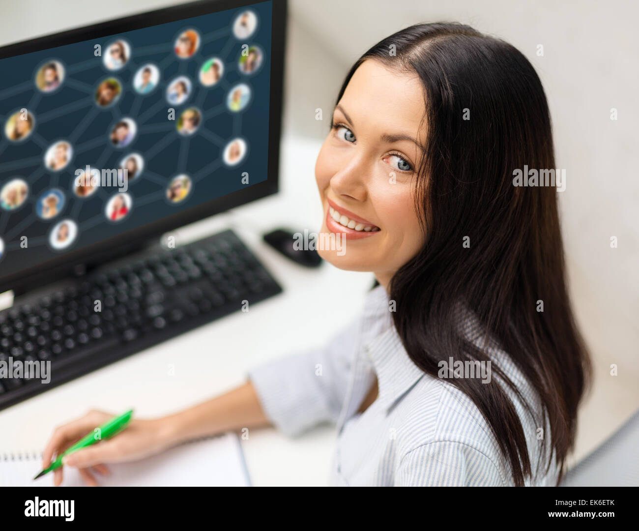 smiling businesswoman with computer Stock Photo - Alamy