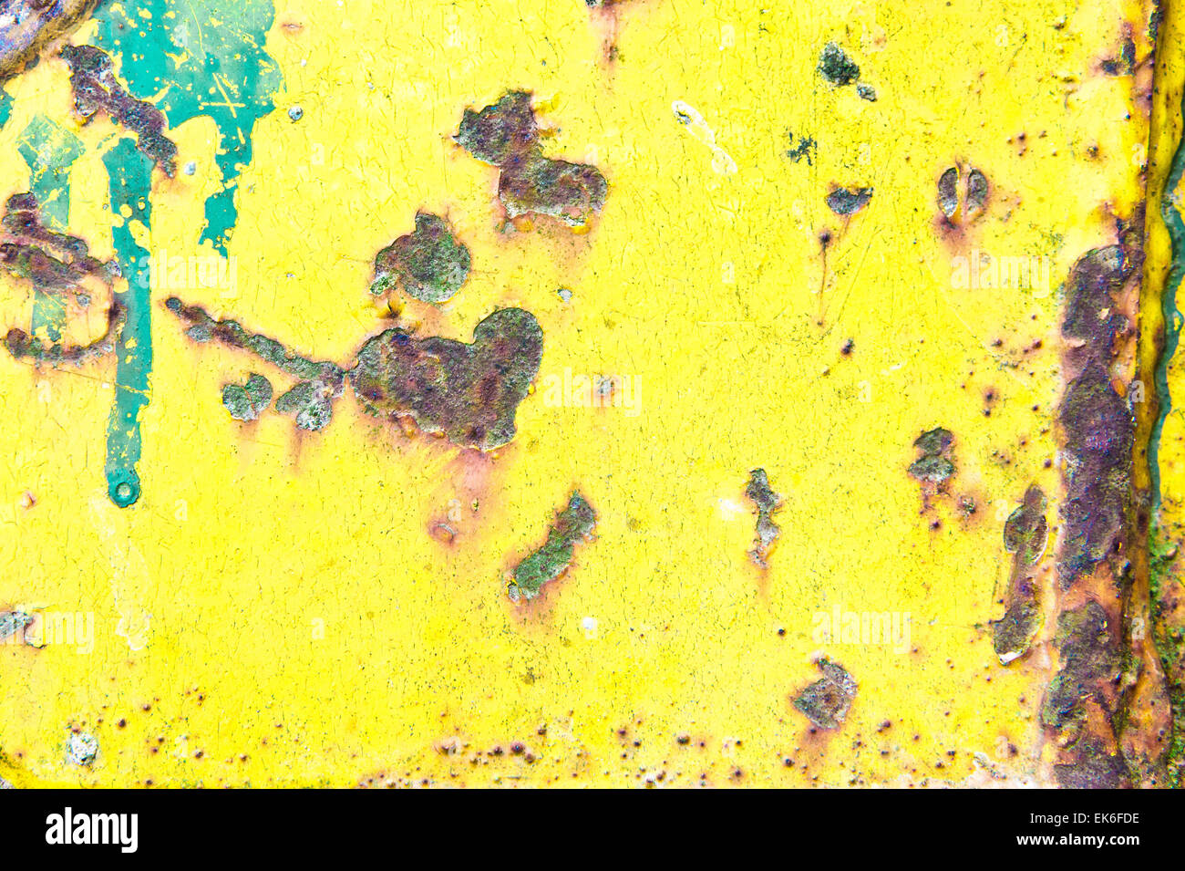Yellow metal sheet with rust patches, as a background Stock Photo - Alamy