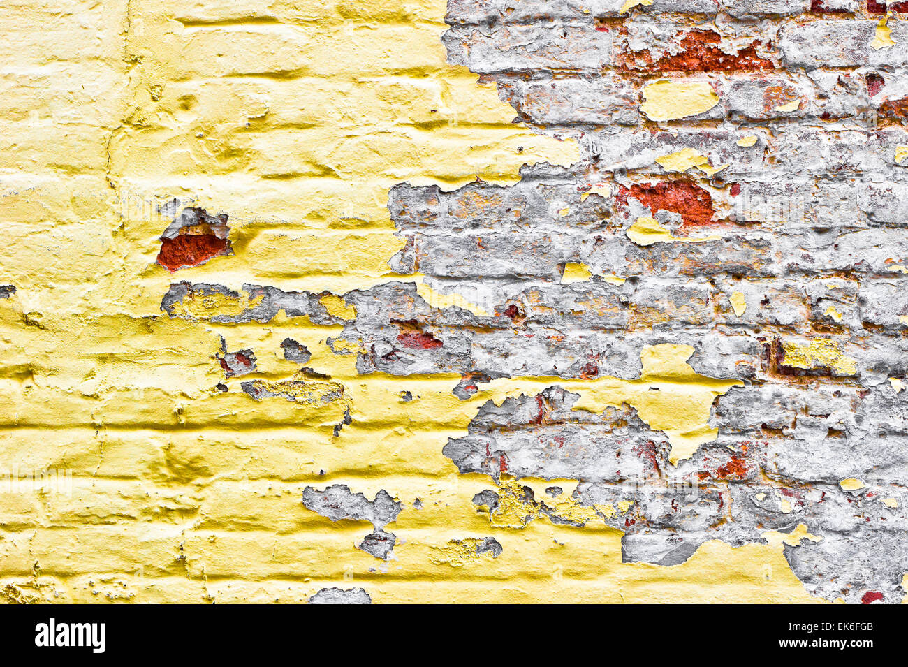 Yellow and grey bricks on a wall Stock Photo - Alamy