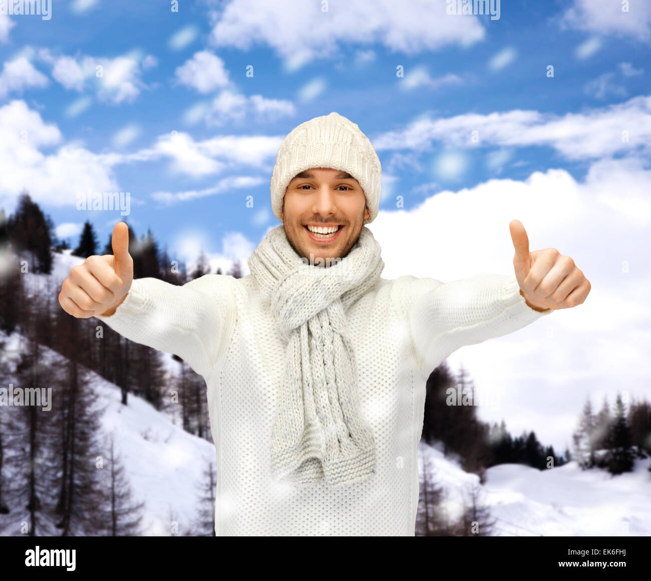 handsome man in warm sweater, hat and scarf Stock Photo - Alamy