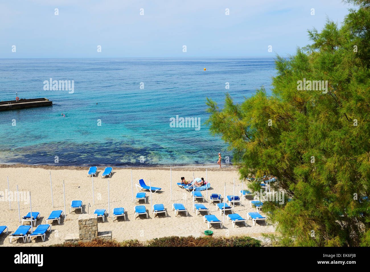 The tourists enjoying their vacation on the beach, Crete, Greece Stock ...