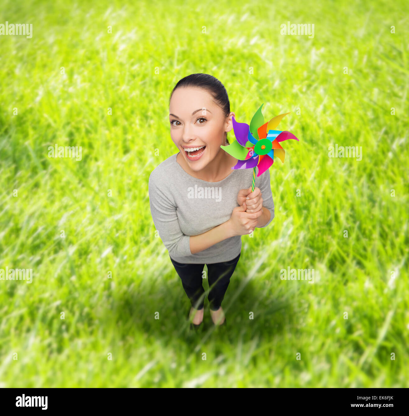 smiling asian woman with windmill Stock Photo - Alamy