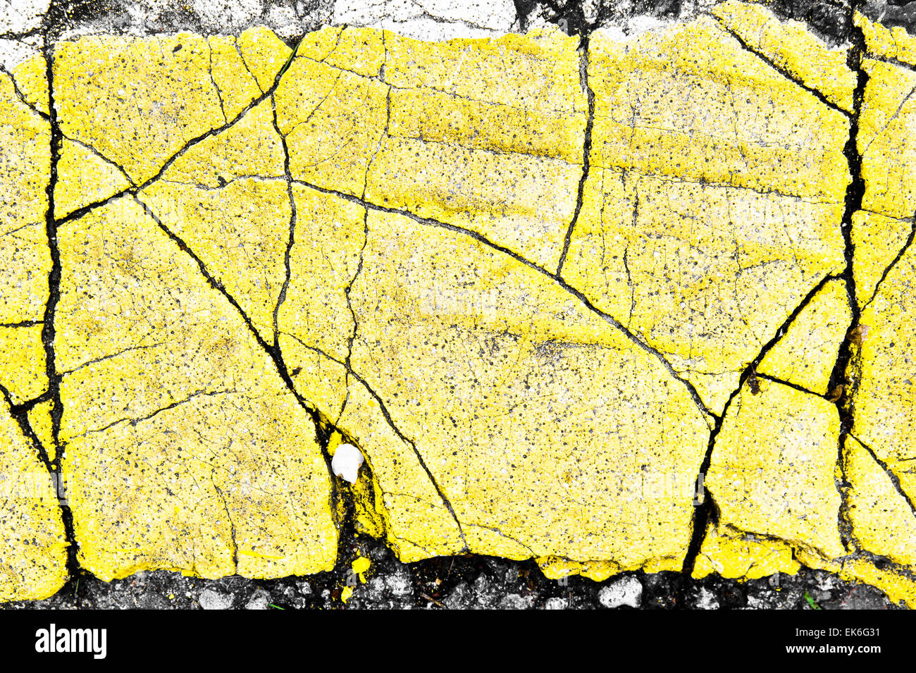 Part of a yellow road marking as an asbtract image Stock Photo - Alamy