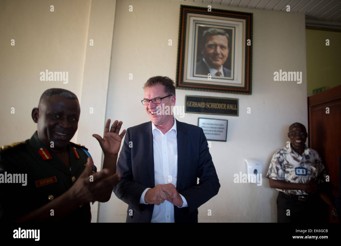 German Minister of Development Gerd Mueller (R) and Major General Obed ...