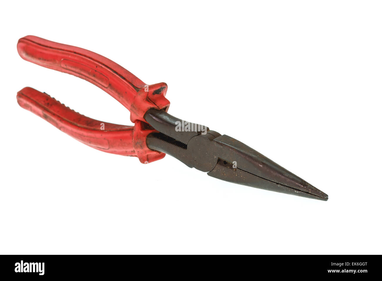 Old and dirty red pliers on white background Stock Photo - Alamy
