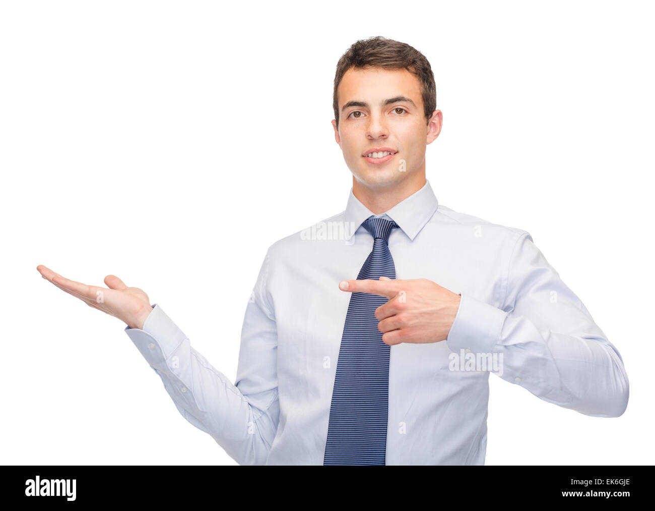 Isolated young man giving something hi-res stock photography and images ...