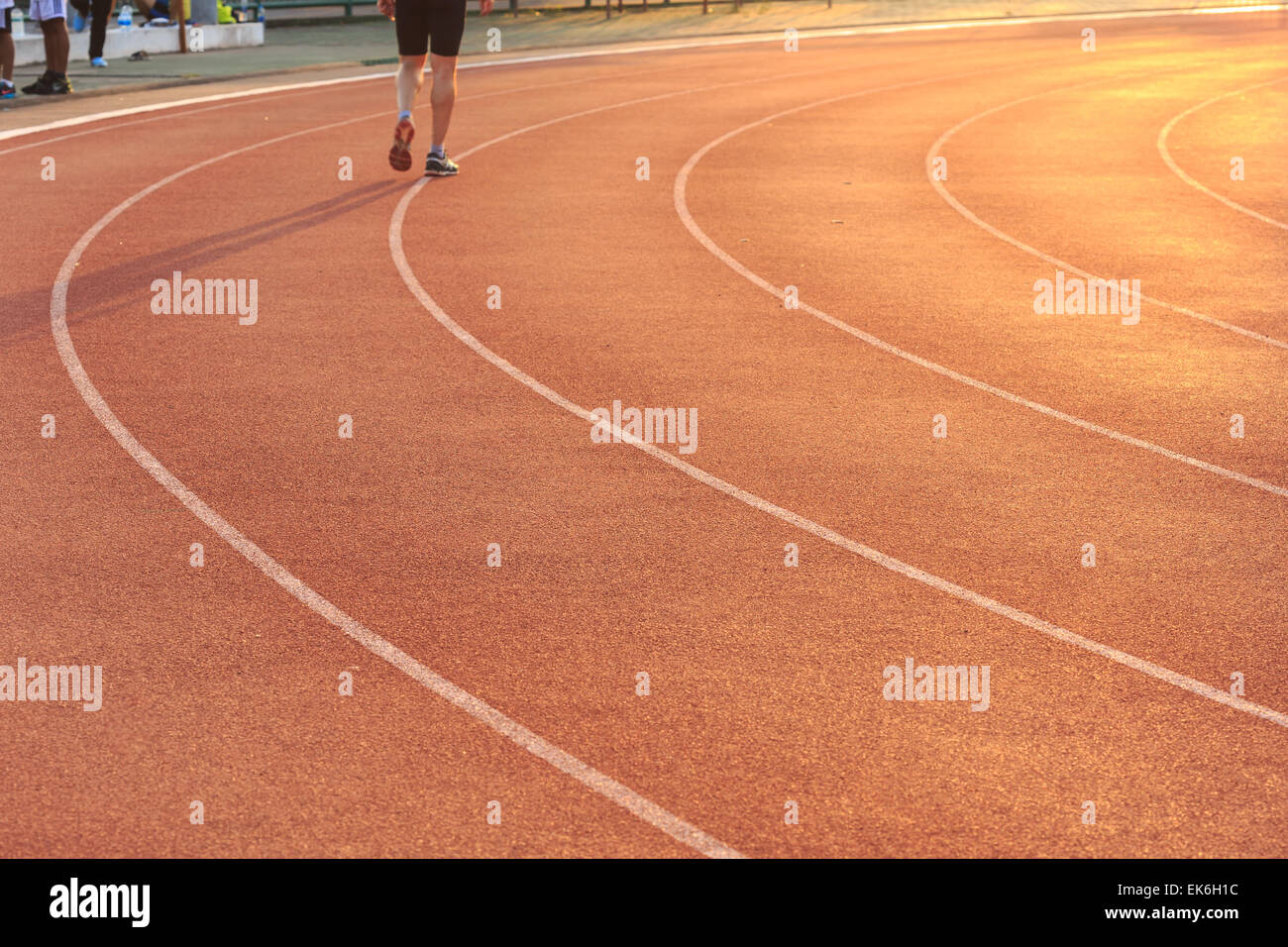Close up Running track with blur of runner feet in stadium Stock Photo ...