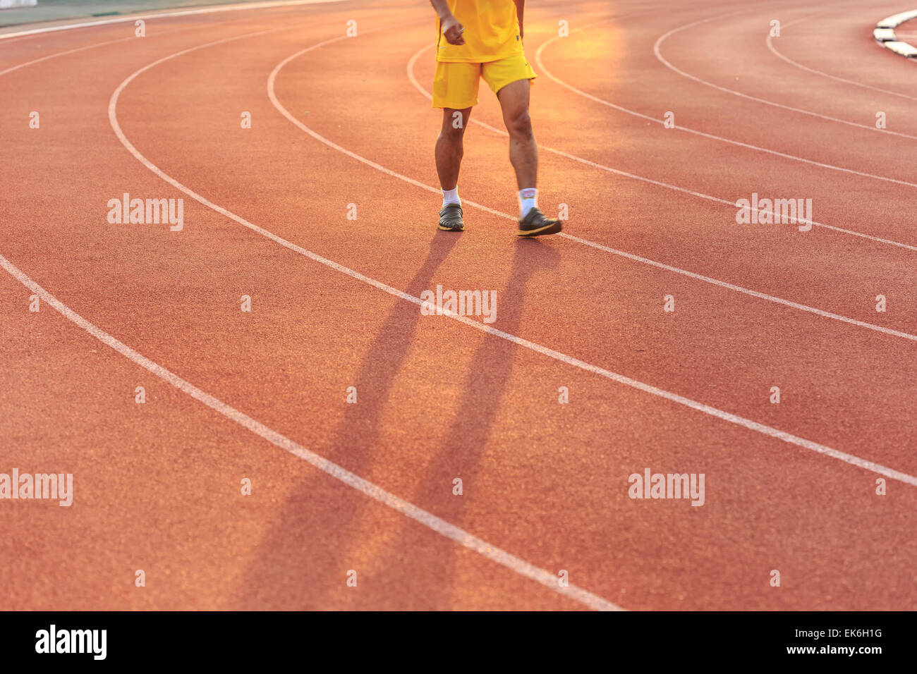 Close up Running track with blur of runner feet in stadium Stock Photo ...
